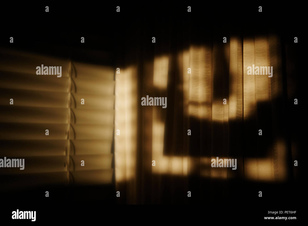 Contrasty shadows and light through blinds at sunset Stock Photo - Alamy
