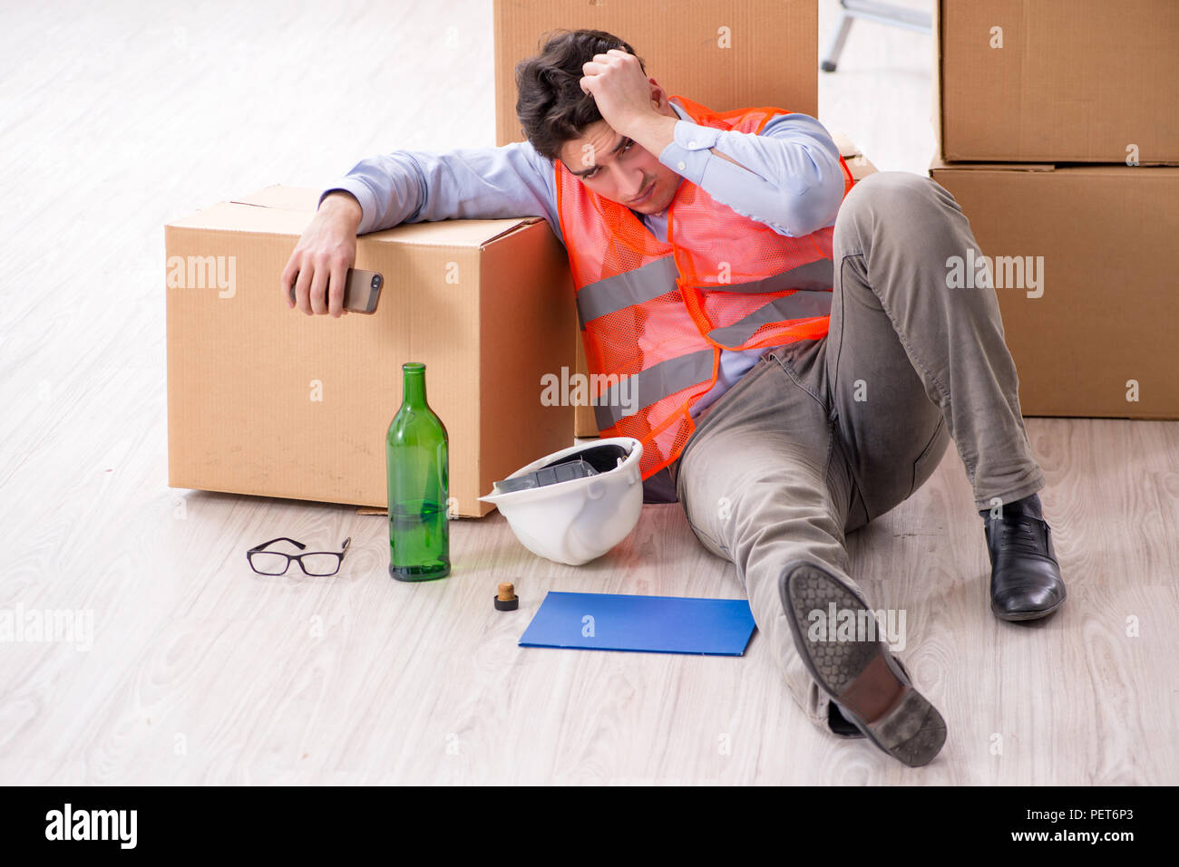 Delivery man drunk at work Stock Photo - Alamy