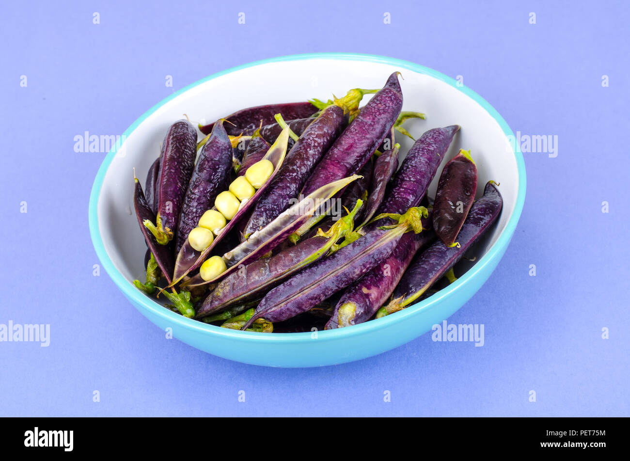 Purple vegetable peas. Studio Photo Stock Photo - Alamy