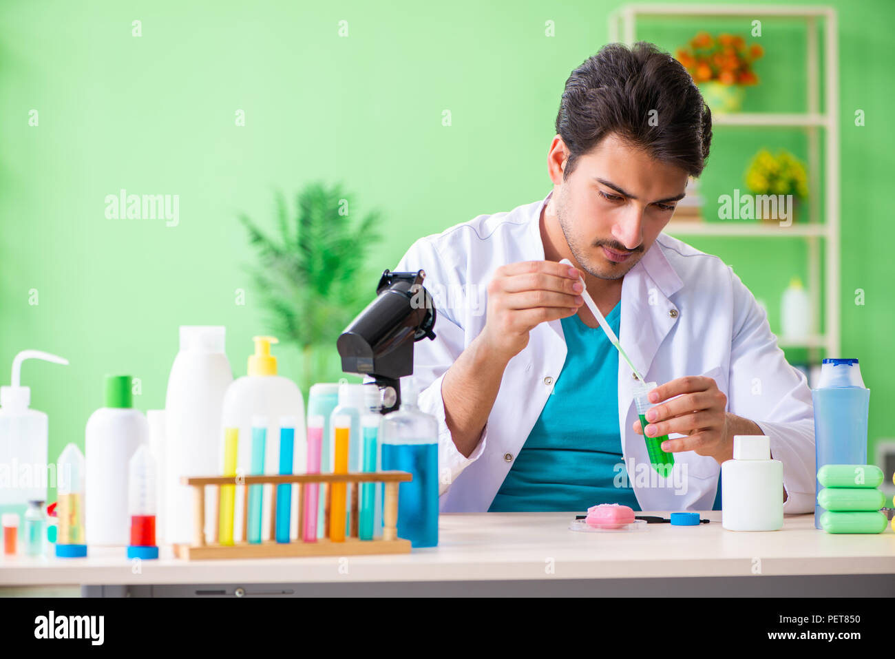 Chemist testing soap in the lab Stock Photo - Alamy