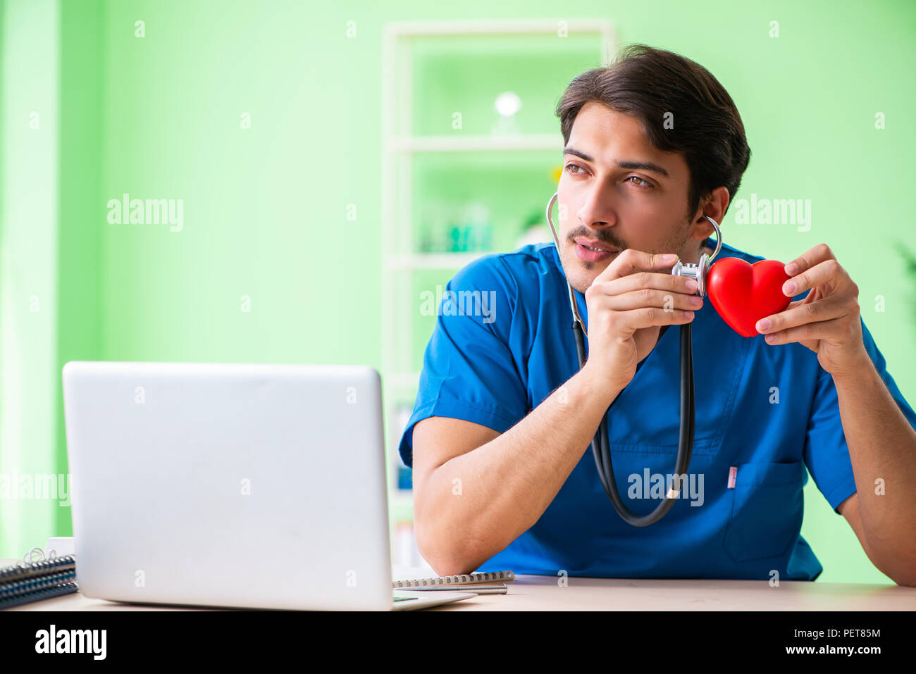 Doctor student explaining heart problems Stock Photo - Alamy