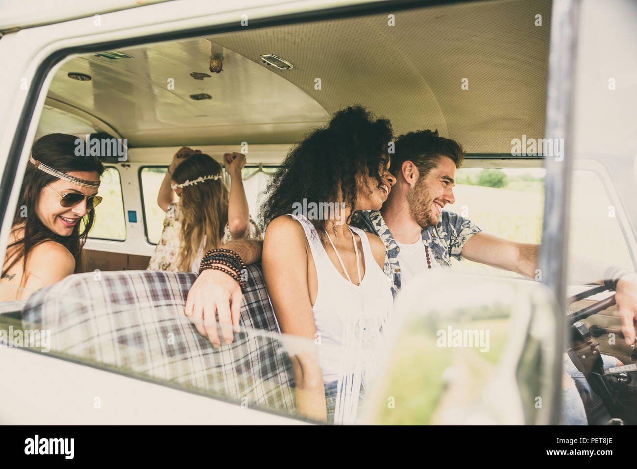 Hippie friends having fun Stock Photo - Alamy