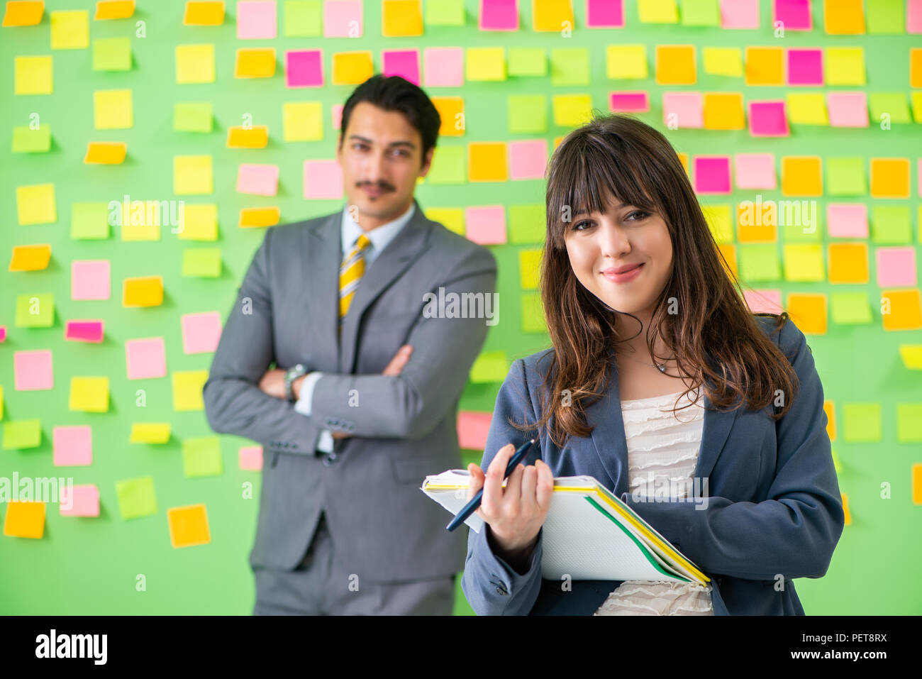 Business colleagues discussing future priorities Stock Photo - Alamy