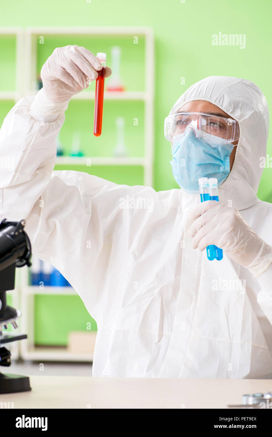 Doctor doing blood analysis in the lab Stock Photo - Alamy
