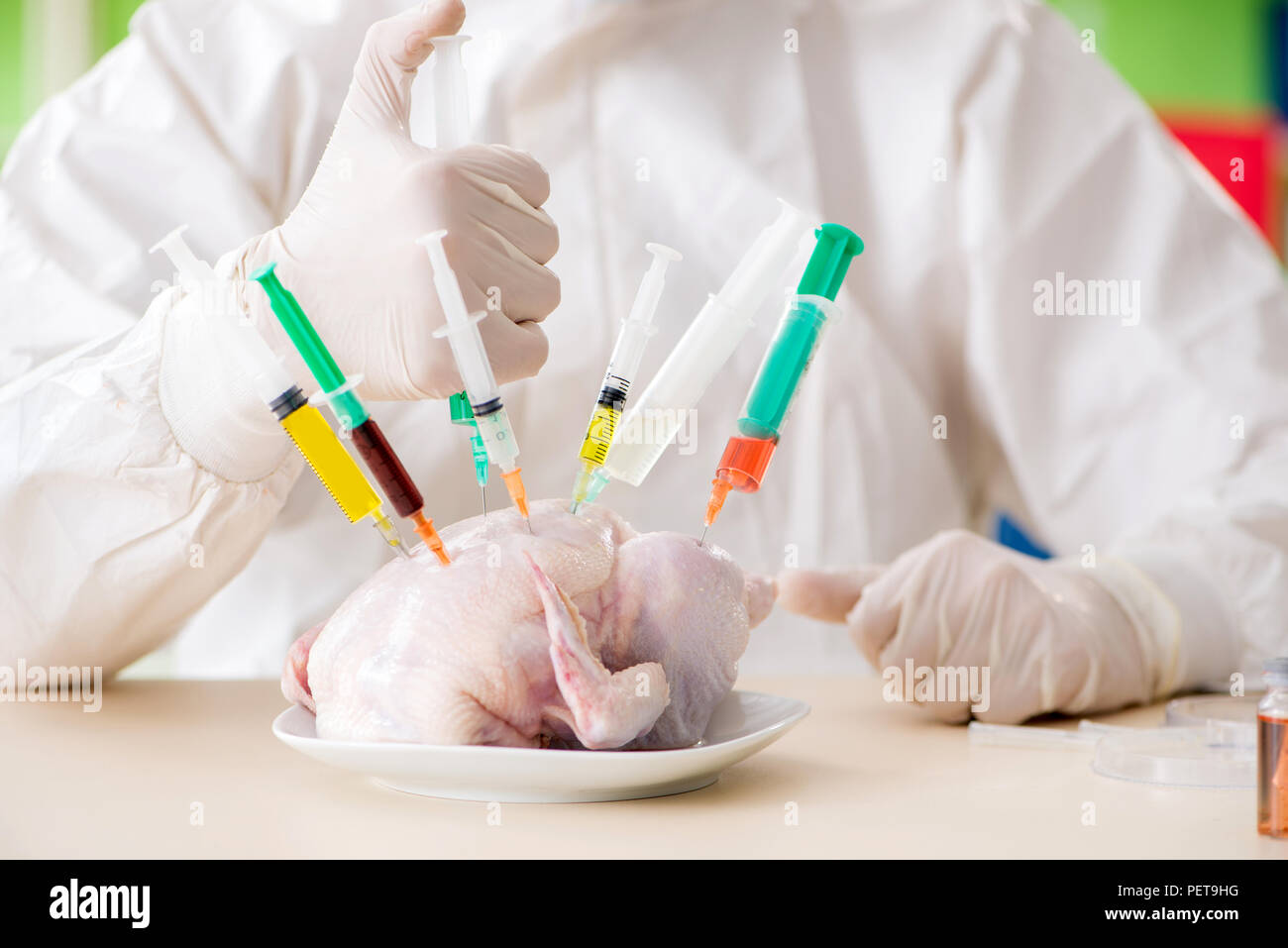 Lab assistant testing GMO chicken Stock Photo - Alamy