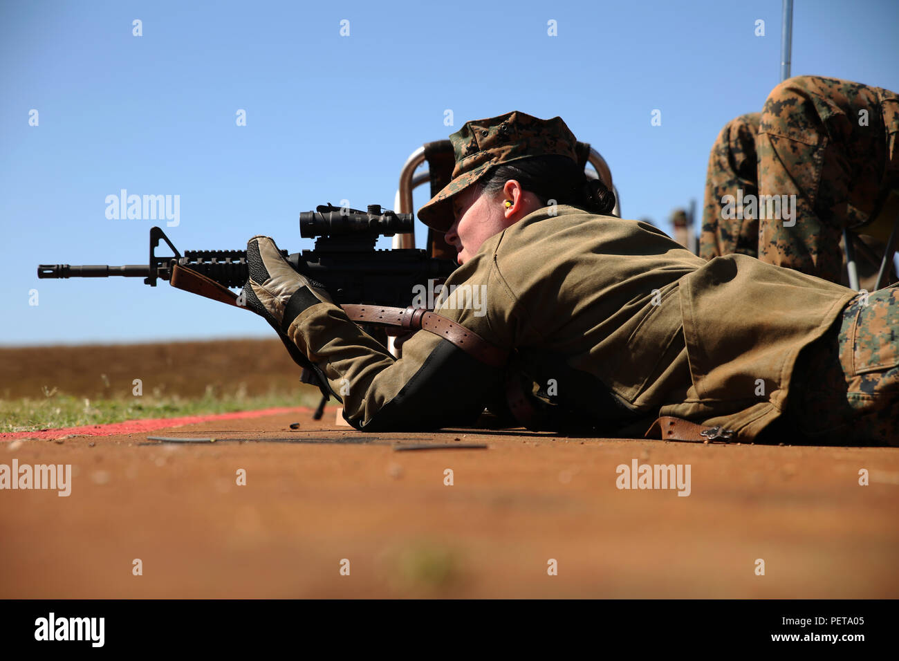 A U.S. Marine fires from the prone position at the 500-yard line during ...