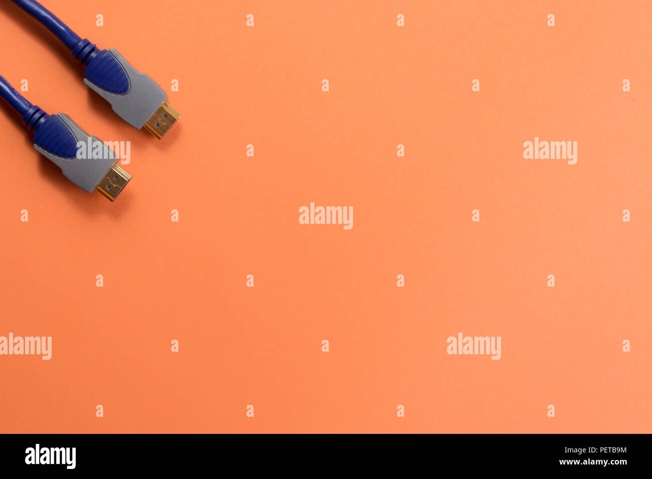 HDMI plug on pastel background topview. Technology or electricity ...