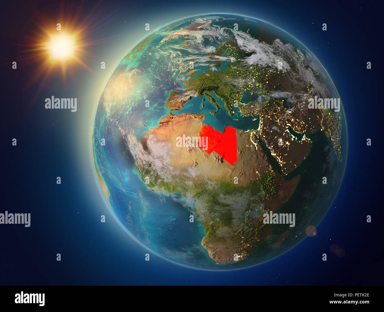 Sunset above Libya highlighted in red on planet Earth with atmosphere ...
