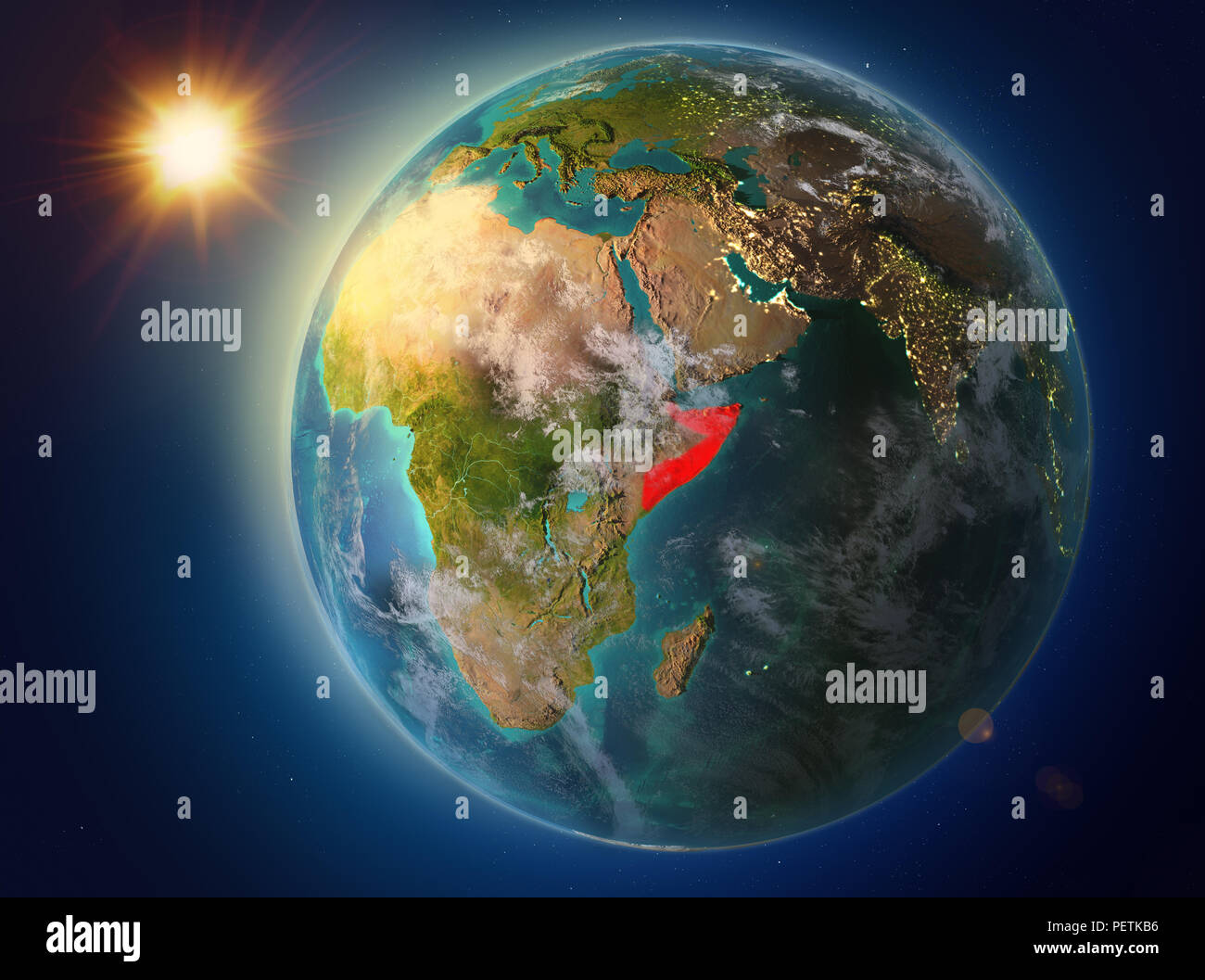 Sunset above Somalia highlighted in red on planet Earth with atmosphere ...