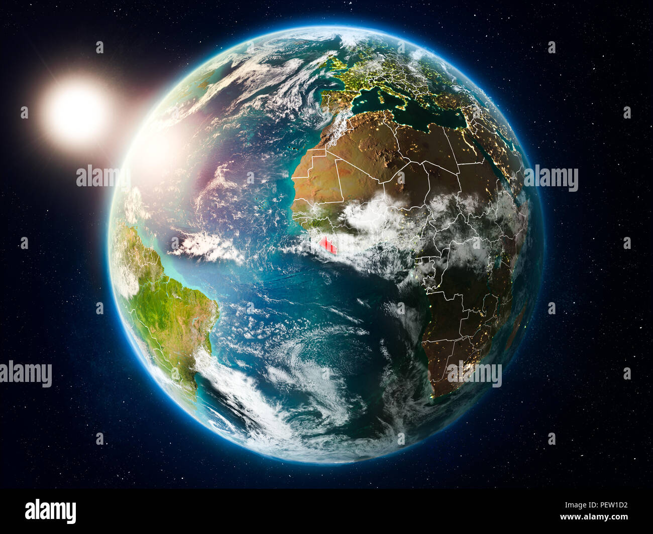 Sunset above Liberia highlighted in red on planet Earth with clouds and visible country borders ...