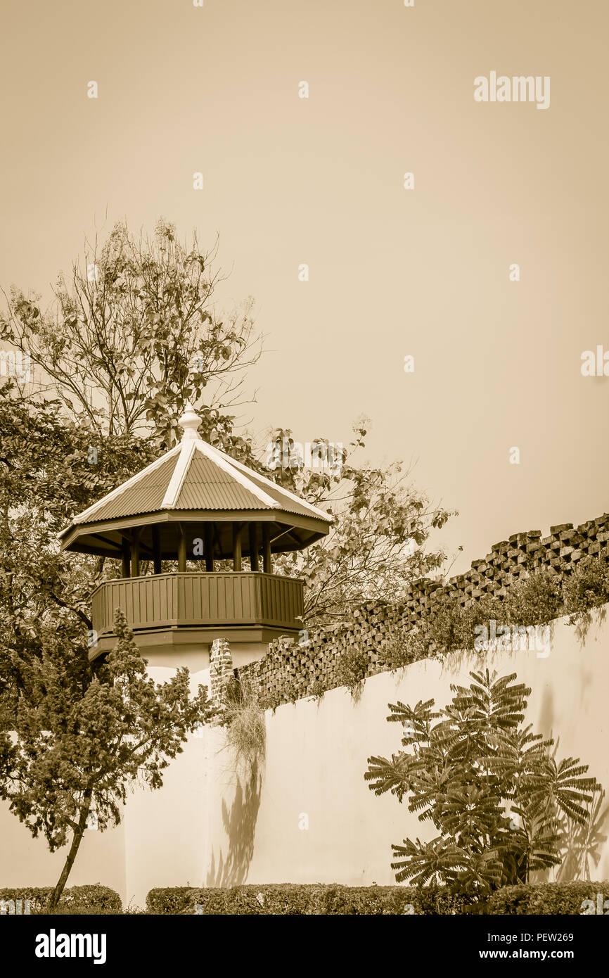 Old prison guard tower that constructed with brick, wood and red roof ...