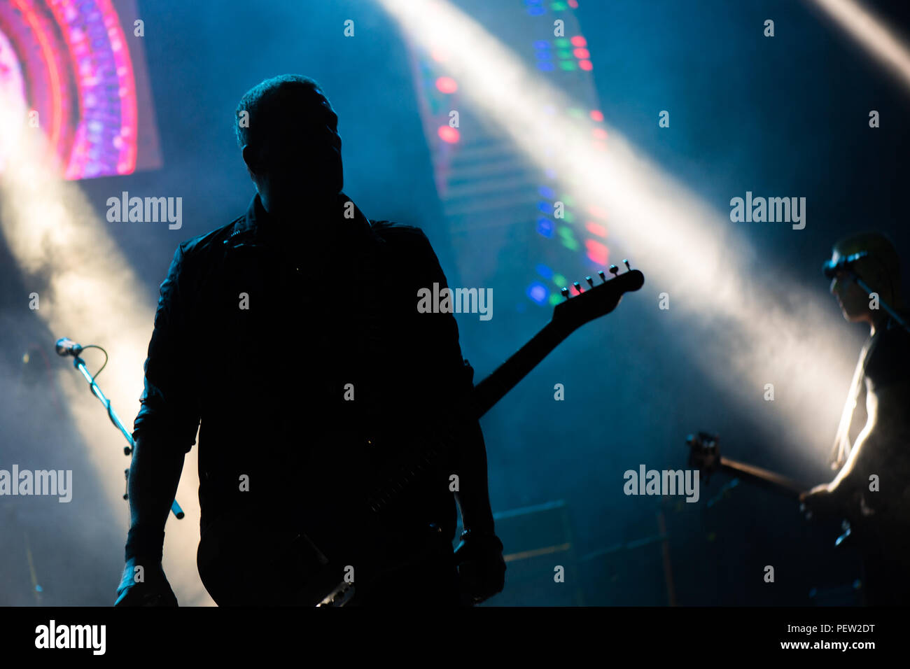 Rock singer on a stage singing rock song Stock Photo - Alamy