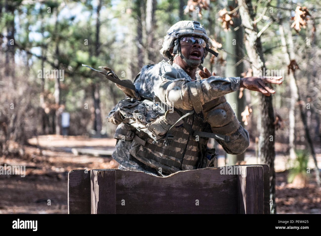 A Soldier in Basic Combat Training with C Company, 1st Battalion, 61st Infantry Regiment tosses ...