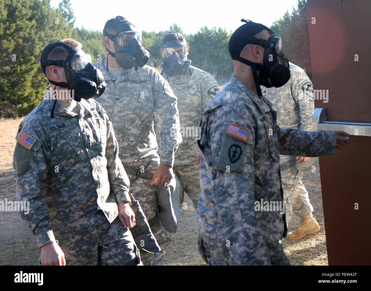 Troopers of HHC, 1st Air Cav. Bde., 1st Cav. Div., enter the chamber ...