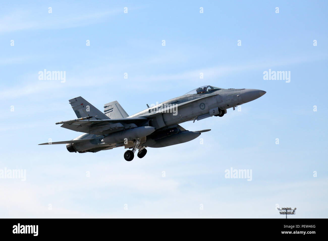 A Royal Australian Air Force No 75 Squadron F/A-18A Hornet departs on a ...