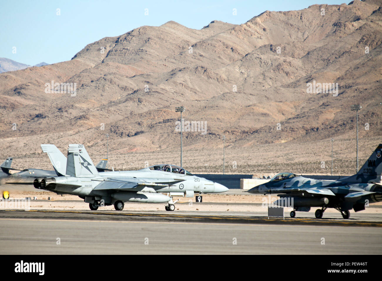 A Royal Australian Air Force No 1 Squadron F/A-18F Super Hornet (left ...