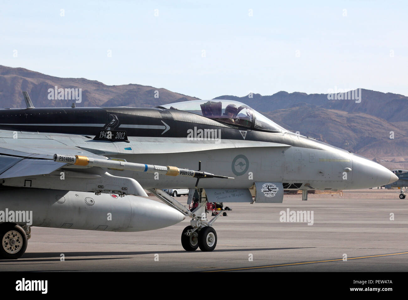 A Royal Australian Air Force No 75 Squadron F/A-18A Hornet departs on a ...
