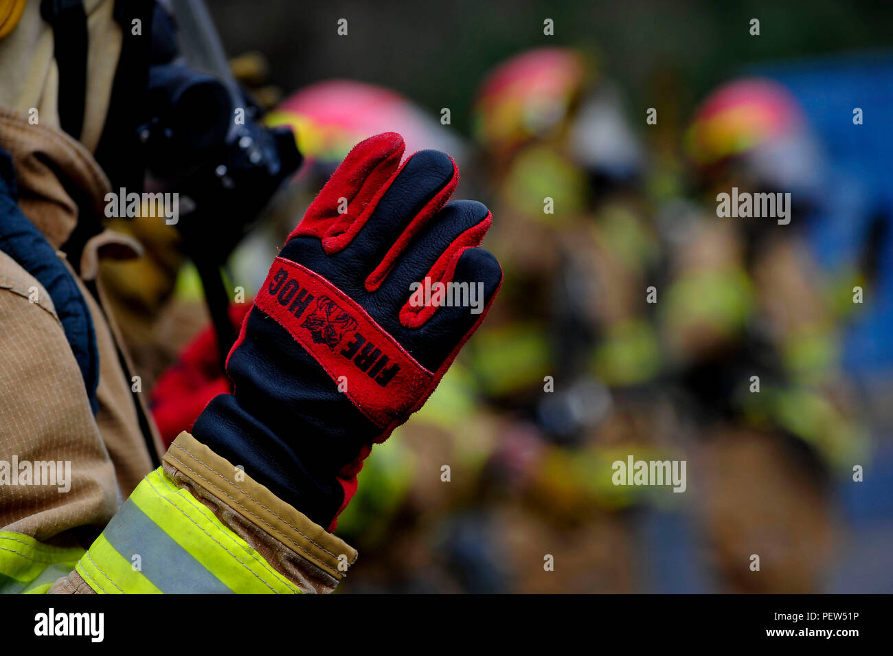 A U.S. Army Soldier stands with his hands up, signifying he is ready ...