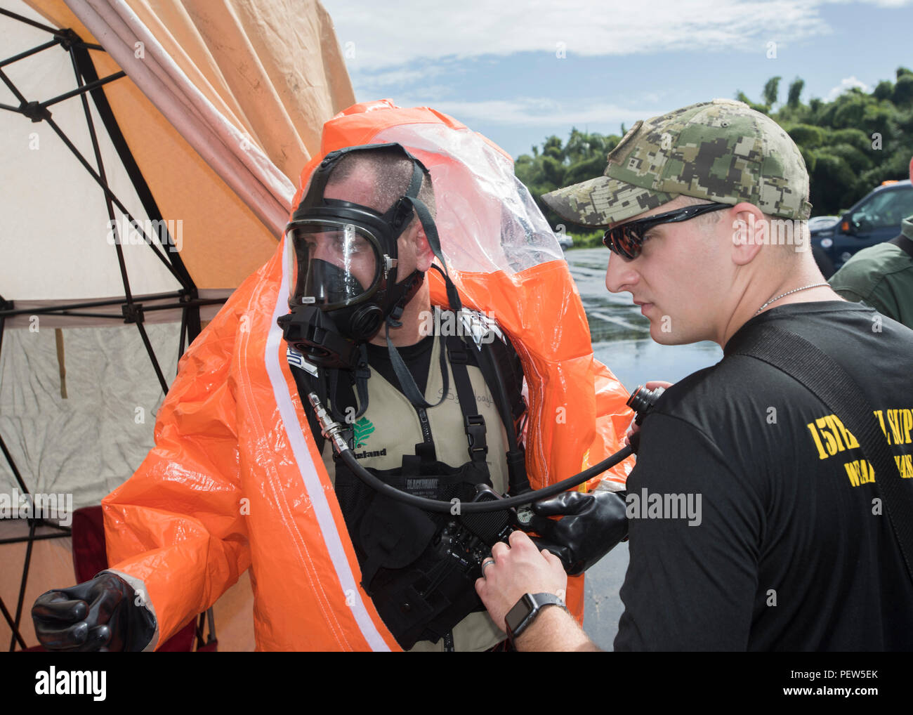 U.S. Army Sgt. Josh Lacasse, survey team member, helps U.S. Air Force ...