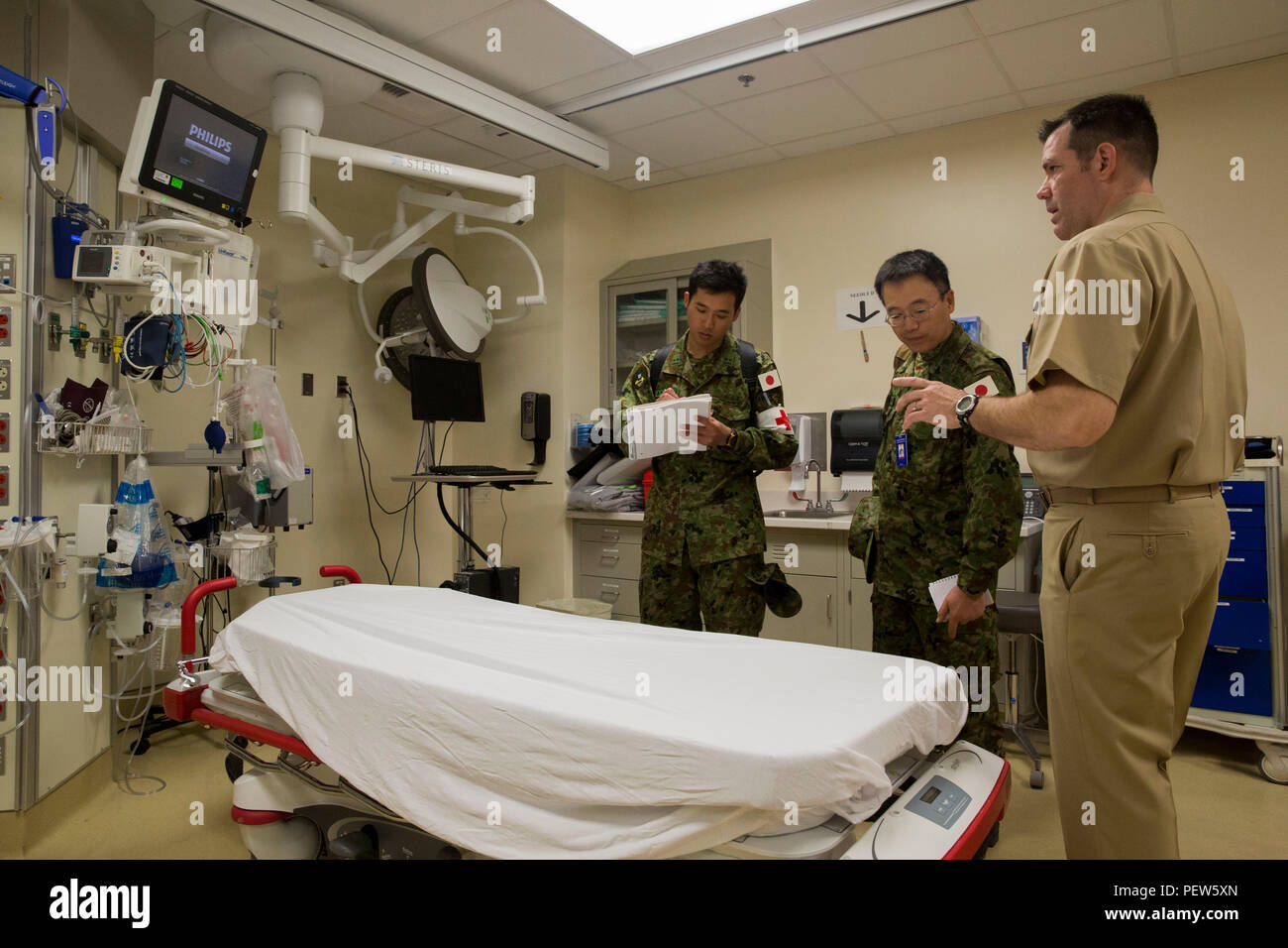 United States Navy Lt. Cdr. Corey Gustafson, an emergency medicine ...