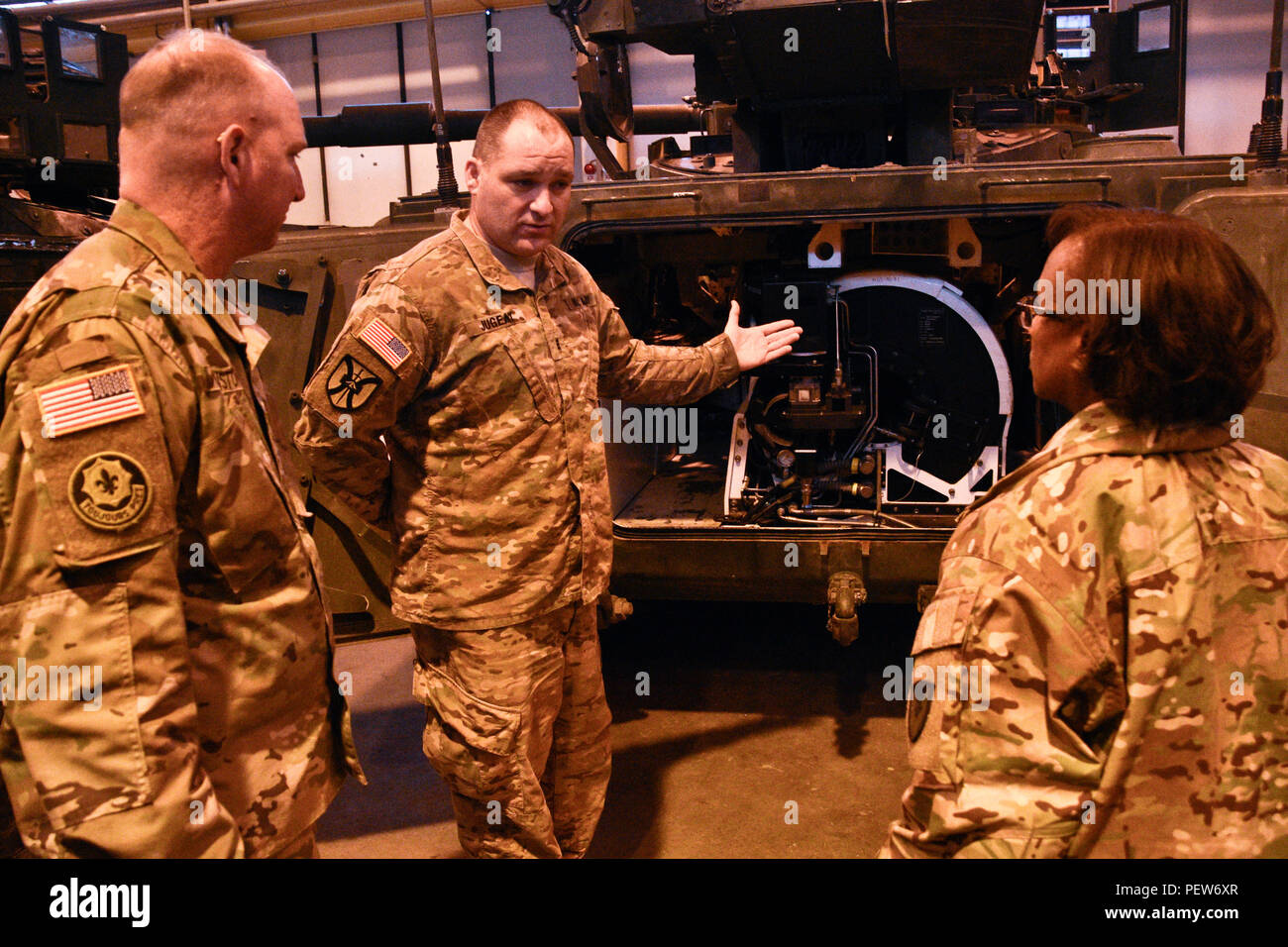 Chief Warrant Officer 3 Yann Jugeat (middle), the Squadron maintenance ...