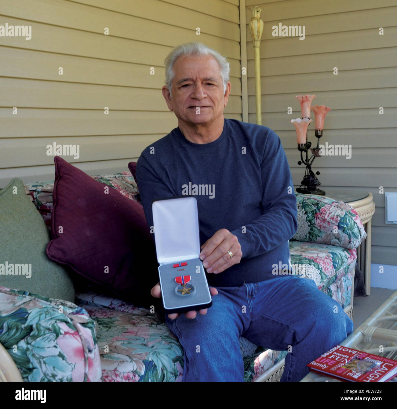 Dennis Spagnoulo, a retired Army sergeant first class, proudly holds ...