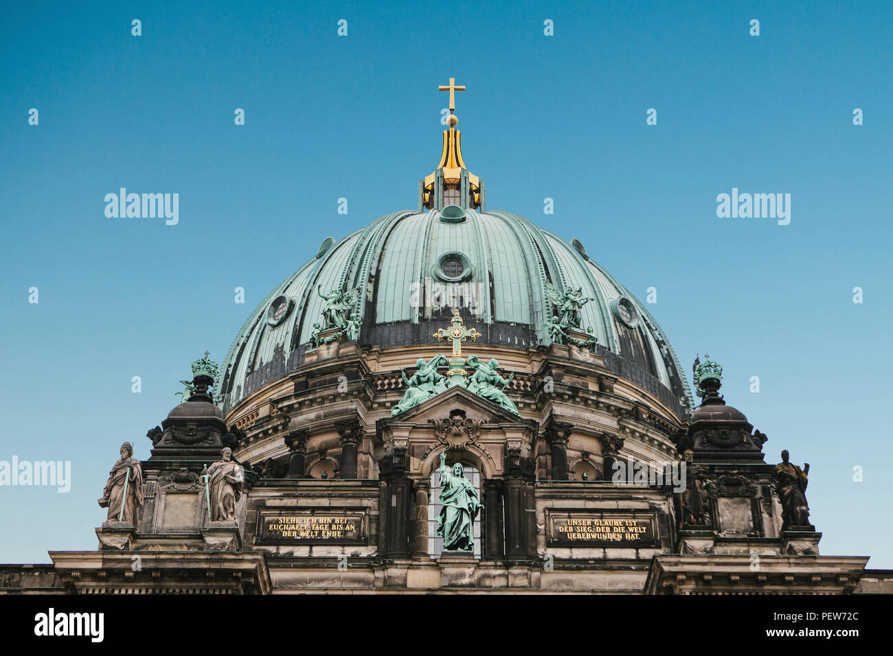 The Berlin Cathedral is called Berliner Dom against the blue sky ...