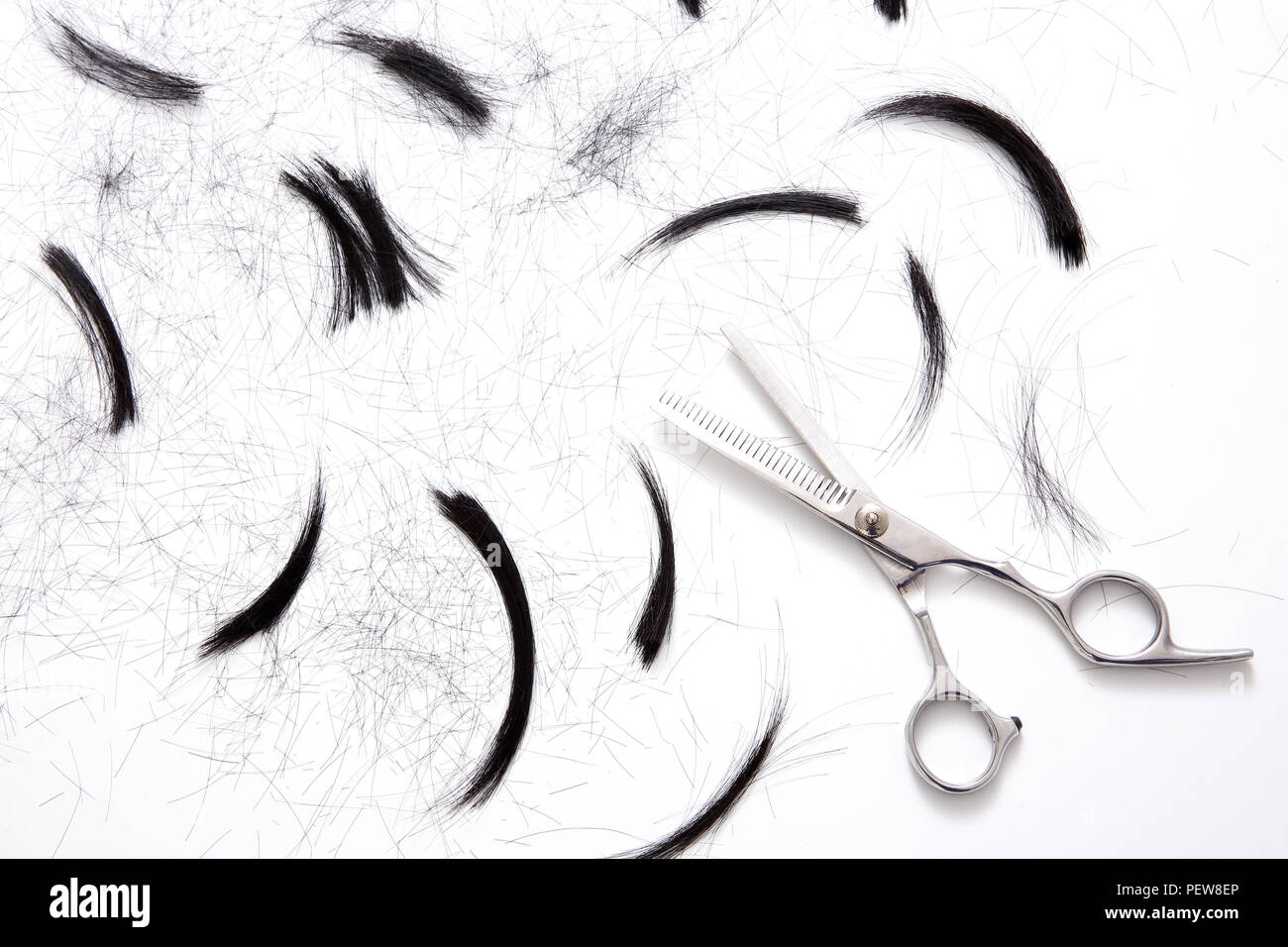 Long colorful hair with objects related to hair salon on close up ...