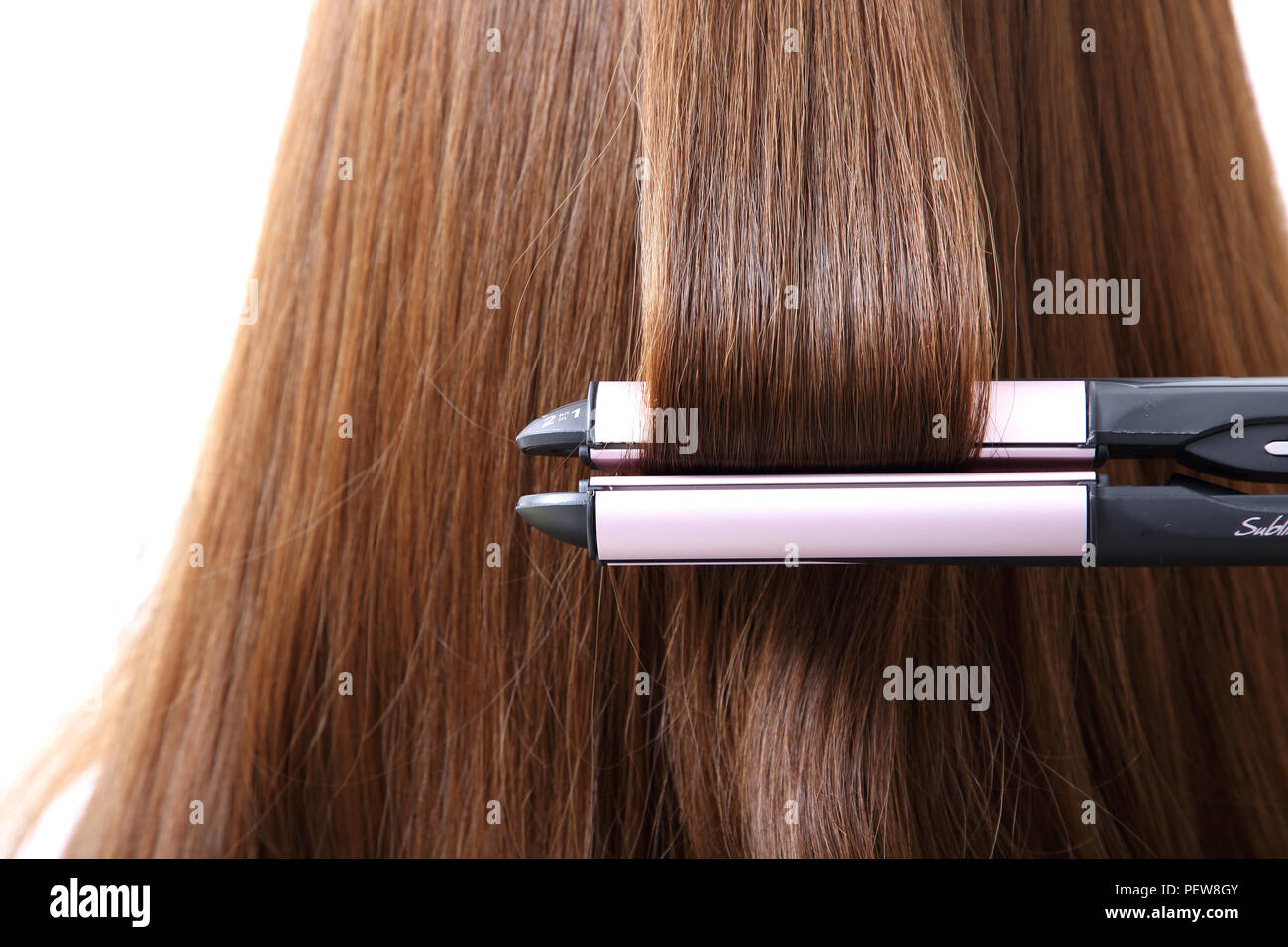 Long colorful hair with objects related to hair salon on close up ...
