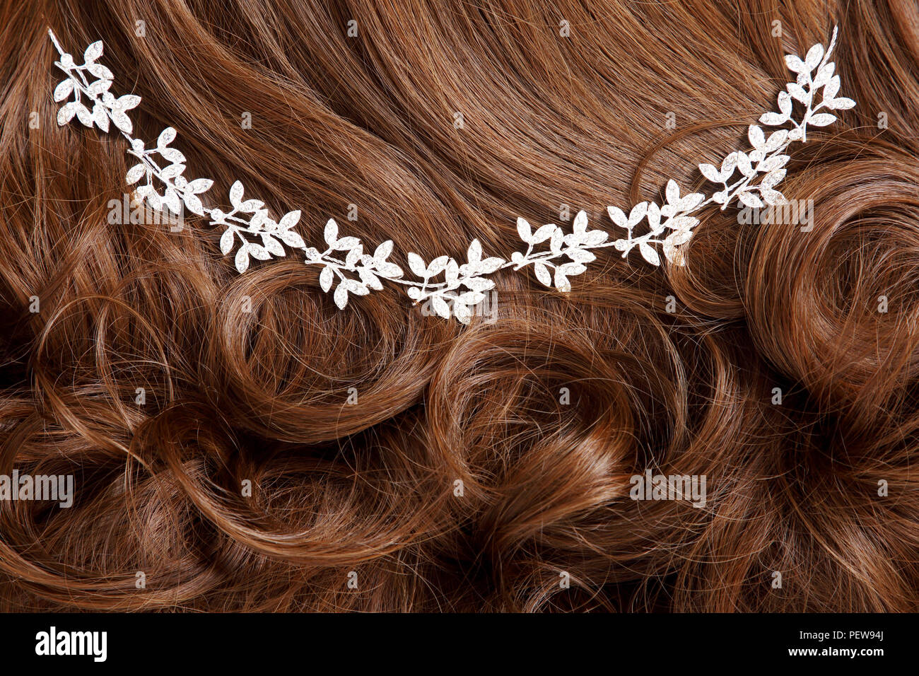 Long colorful hair with objects related to hair salon on close up ...