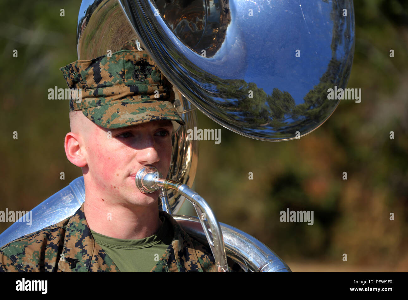 Cpl. Brian Koons plays a sousaphone in a formation during band practice ...
