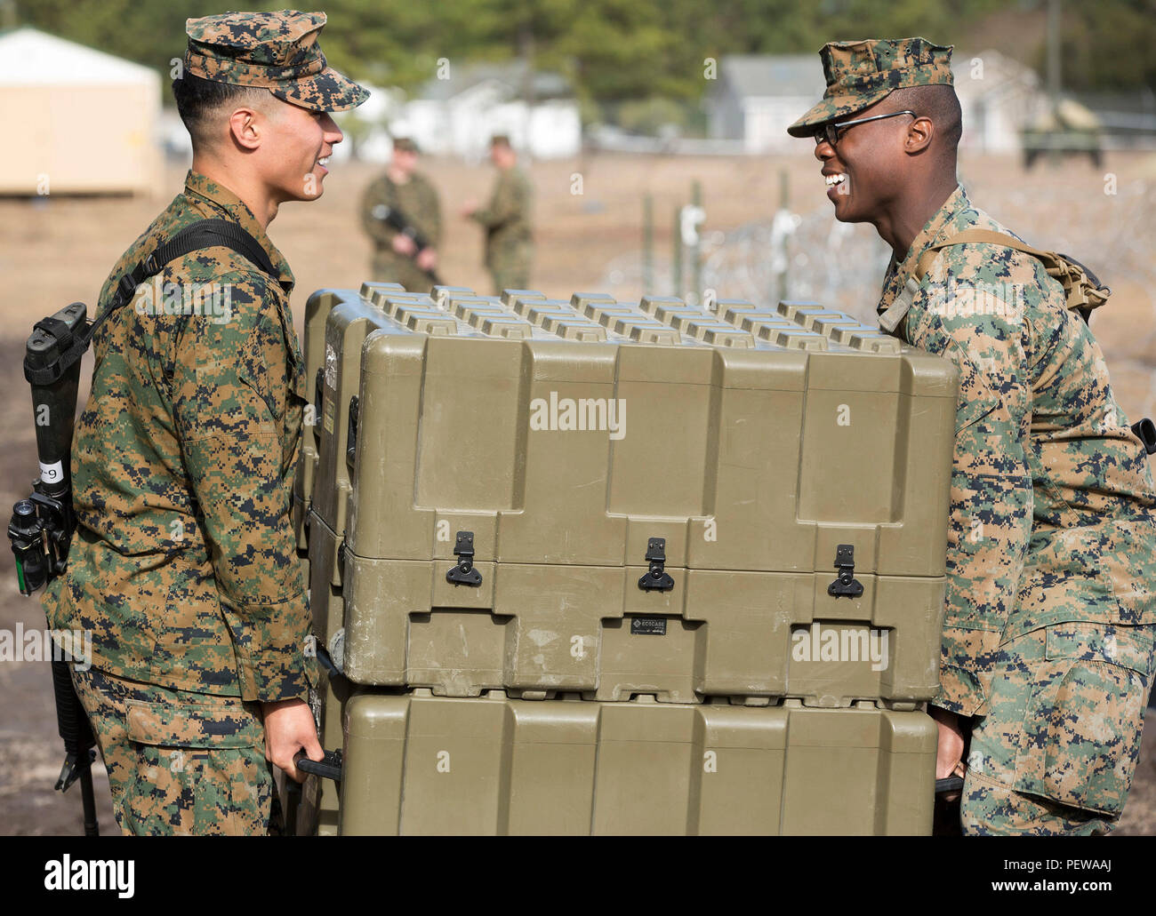 U.S. Marine Corps Sgt. Anthony W. Rodriguez, left, Headquarters Company ...