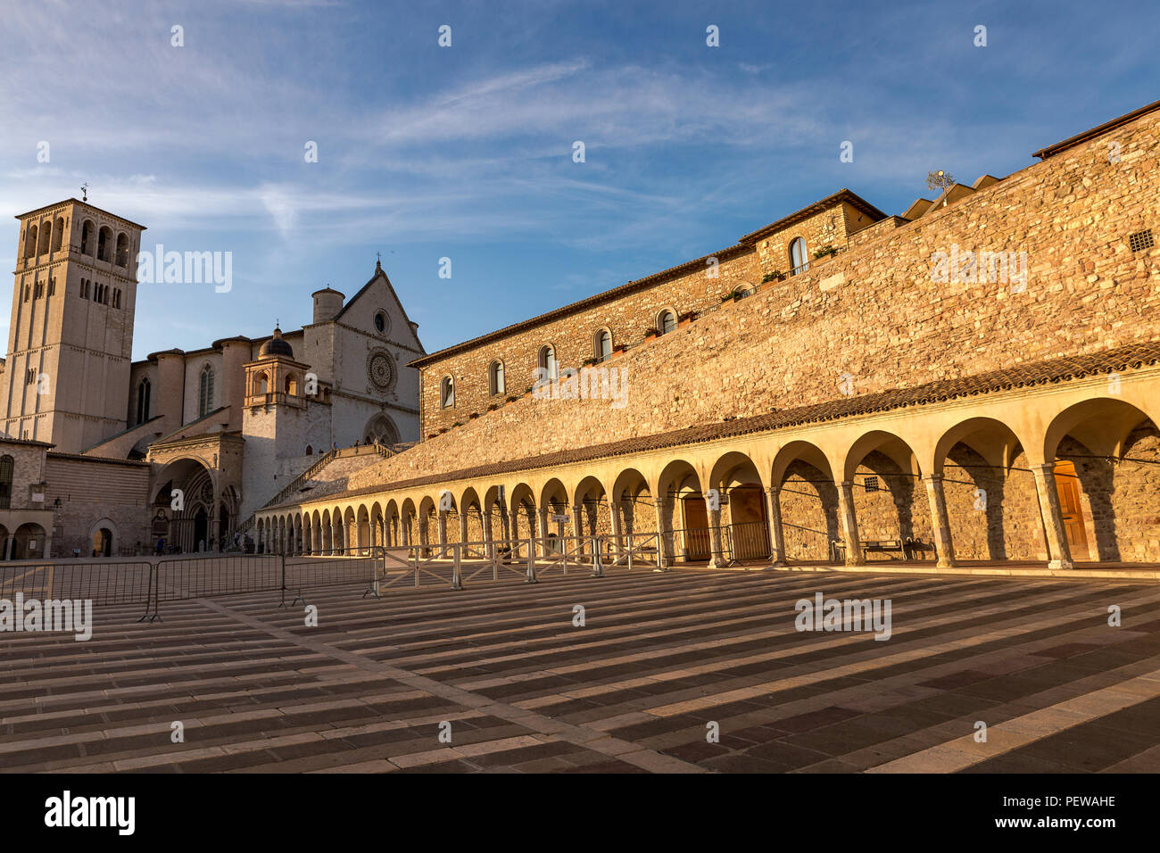 italy: colonnade of the square in front of the cathedral of Saint ...