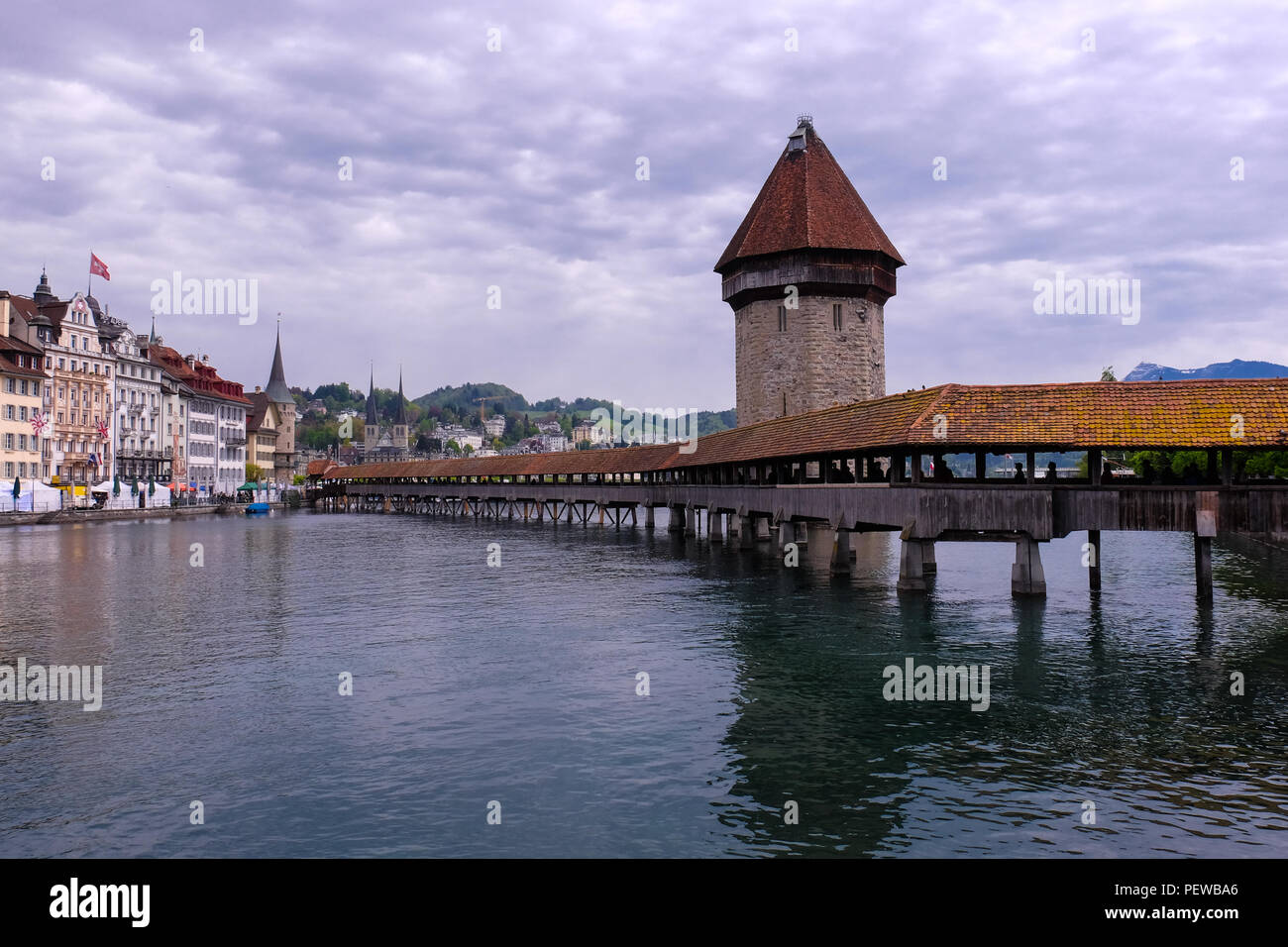 Landscape view of the Kapellbrücke is a covered wooden footbridge ...