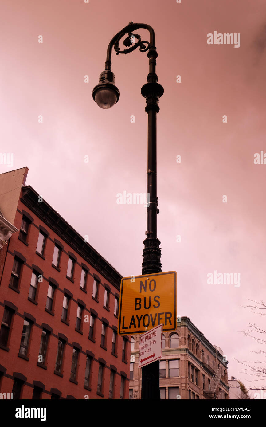 Portrait view of a "No bus layover" road sign in the Soho District of ...