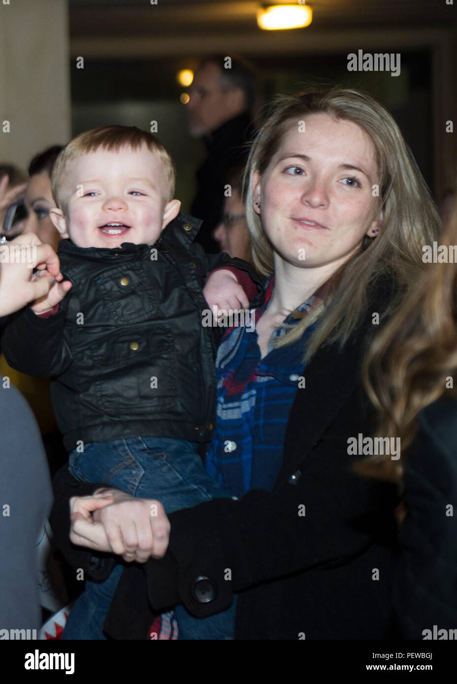 SAN DIEGO (Feb. 2, 2016) - Megan Teel and her son wait outside the ...