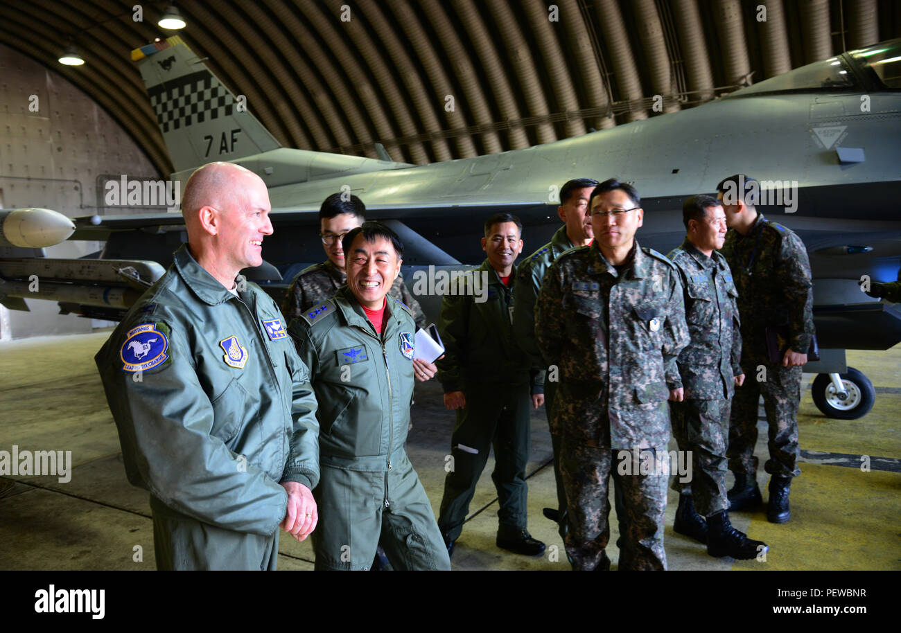Col. Andrew Hanson, 51st Fighter Wing commander, escorts Maj. Gen. Choi ...
