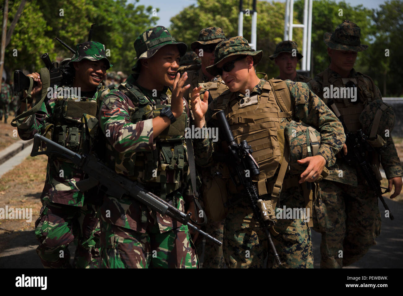 U.S. Marine Corps Staff Sgt. David Stephens, right, a platoon sergeant ...