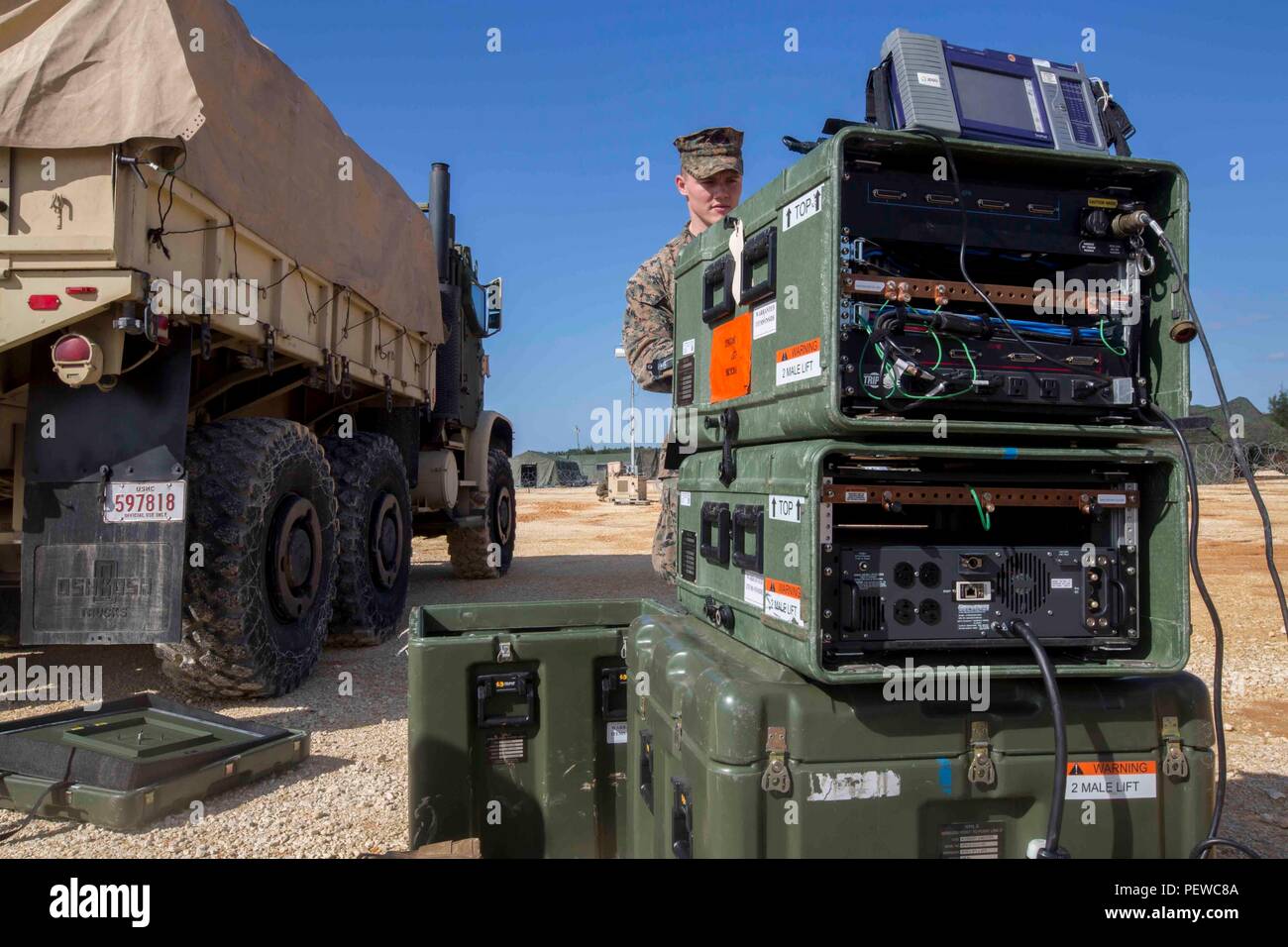 A U.S. Marine with 7th Communication Battalion works during Command ...