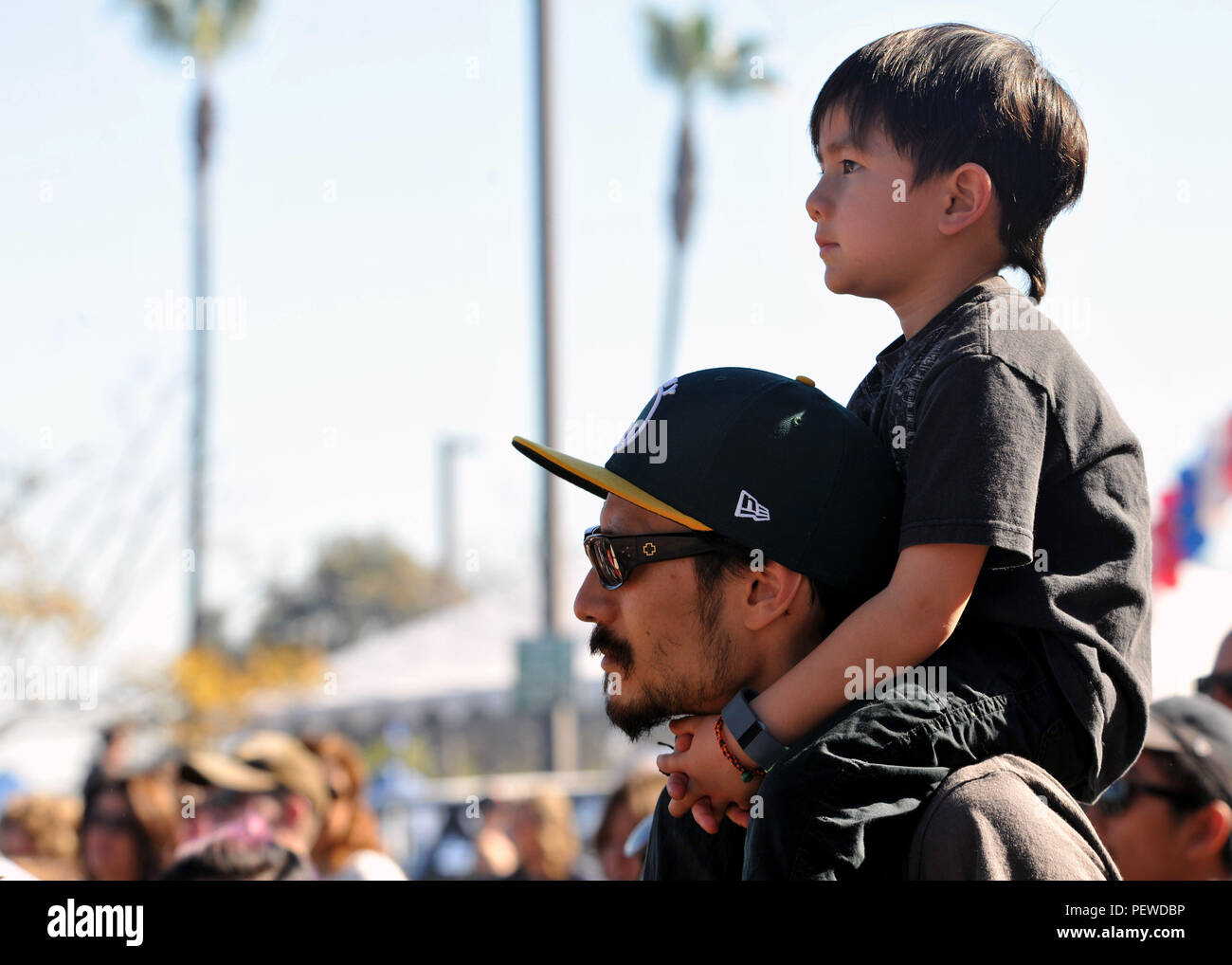 150206-N-BB534-668 SAN DIEGO (Feb. 6, 2016) Adam Mau sits on his father ...