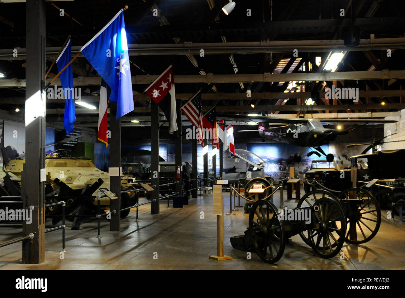 Displays and exhibits line the open foyer at the Texas Military Forces ...