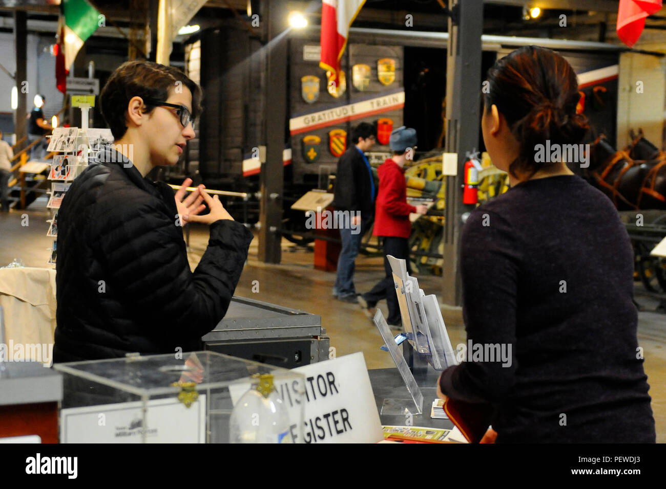 Volunteer Alexis Corona greets a guest at the front desk in the Texas ...