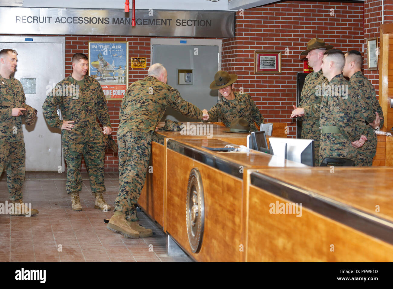 U.S. Navy Rear Adm. Brent Scott, Chaplain of the Marine Corps, right ...