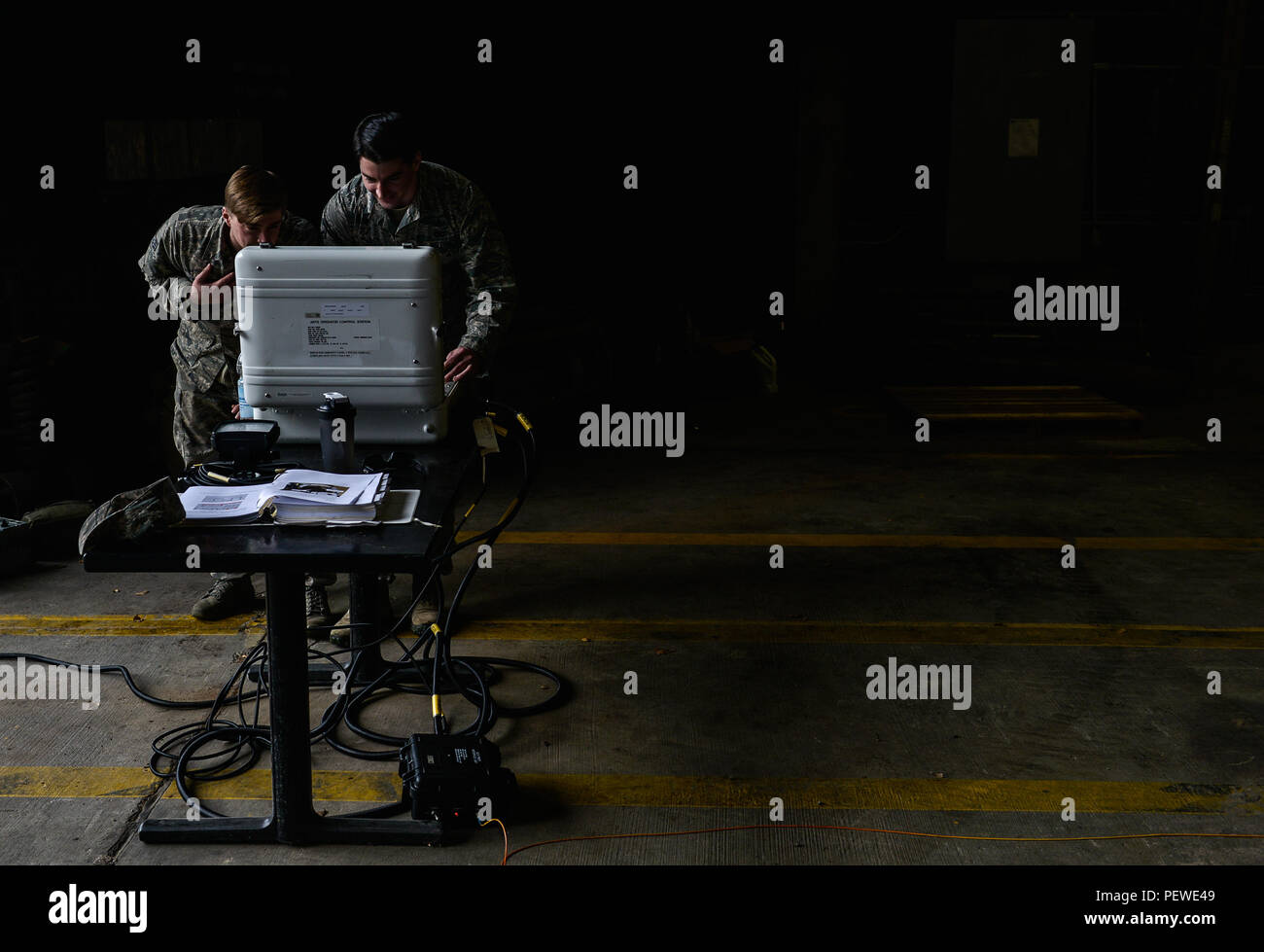 Senior Airman Jeffrey Knelange and Airman 1st Class Kevin Leyden, both ...