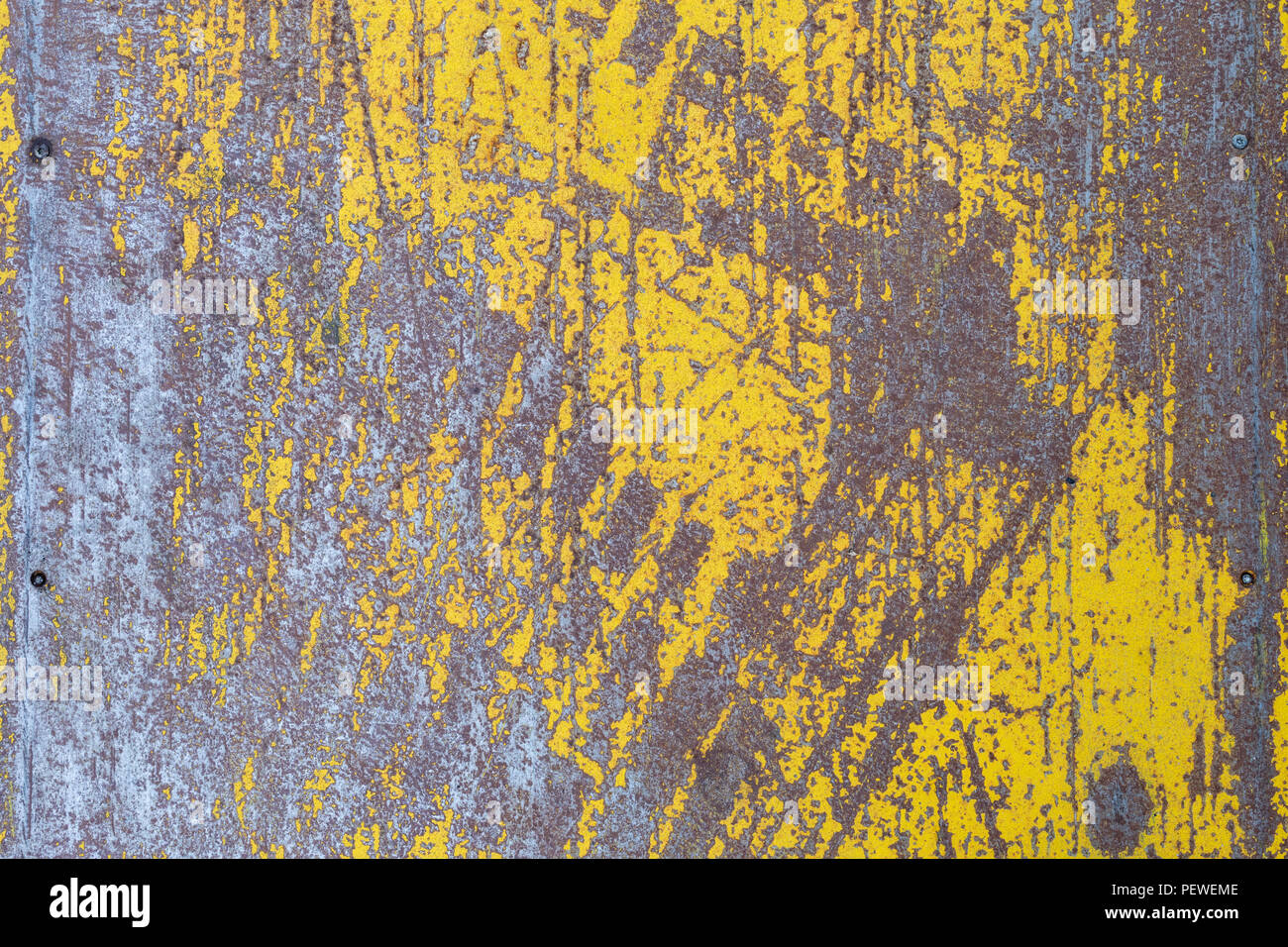 Worn yellow paint on metal sheet texture background Stock Photo - Alamy