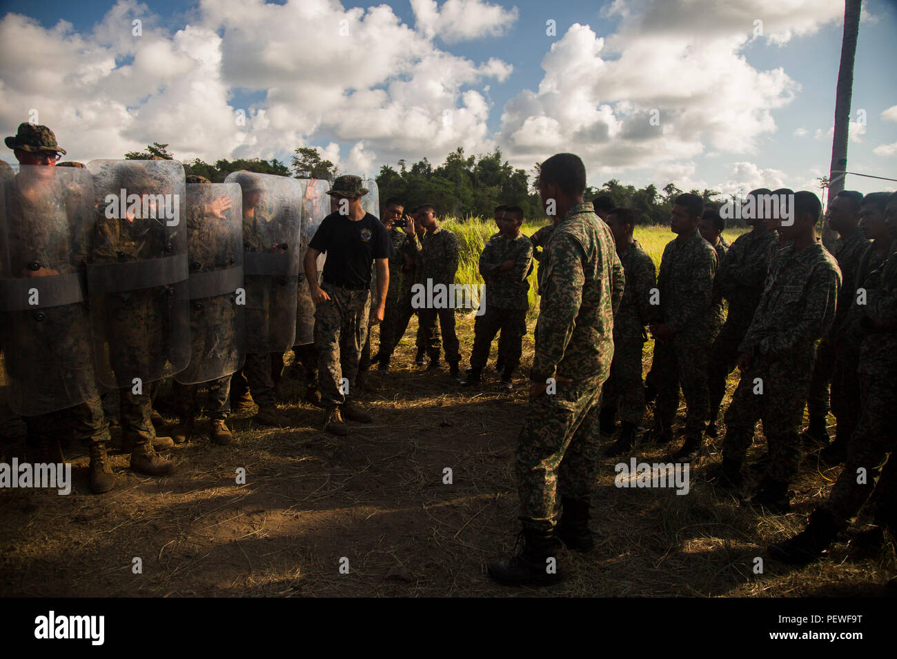 U.S. Marine Corps Sgt. Garrett Spino, left, a squad leader with Golf ...