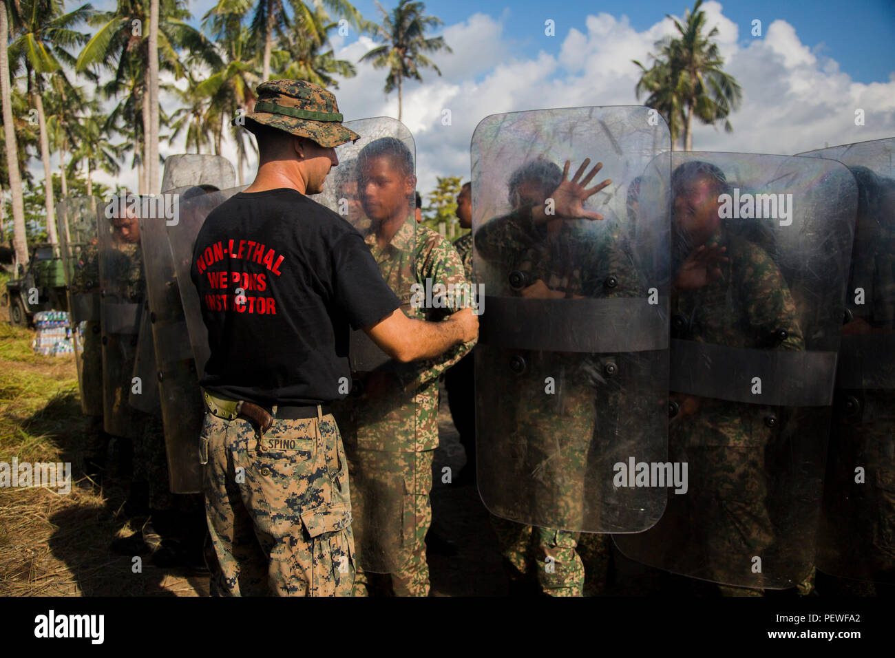 U.S. Marine Corps Sgt. Garrett Spino, left, a squad leader with Golf ...
