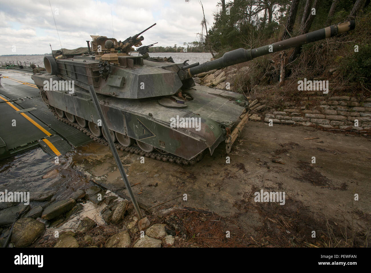 Marines with Bridge Company, 8th Engineer Support Battalion, roll an ...