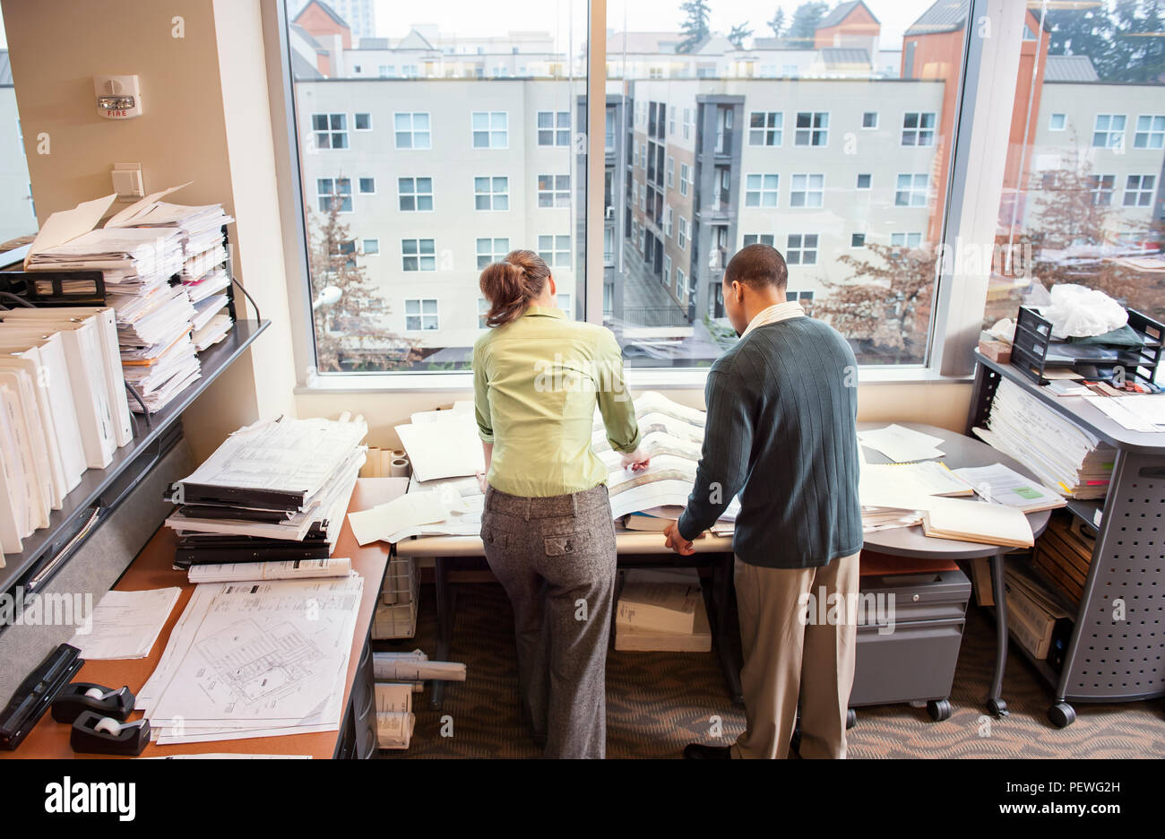 Two women from behind in office hi-res stock photography and images - Alamy