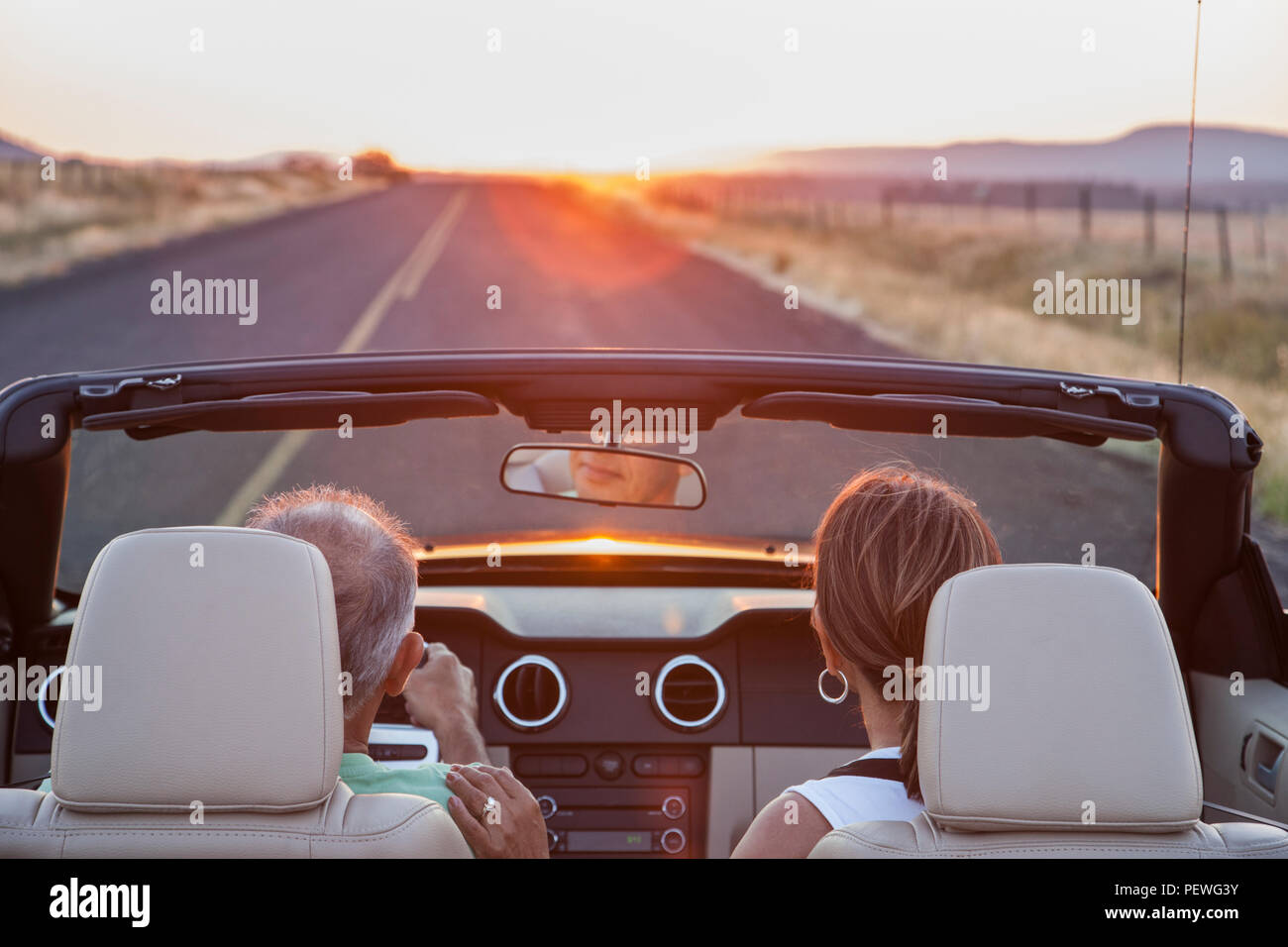 Driving a convertible from behind hi-res stock photography and images ...